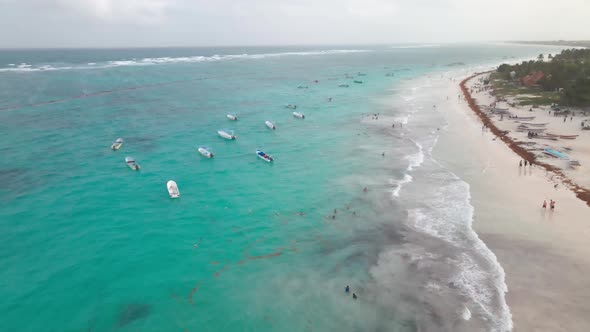 Aerial drone shot over lots of boats in the ocean. Tulum, Mexico, Stock ...