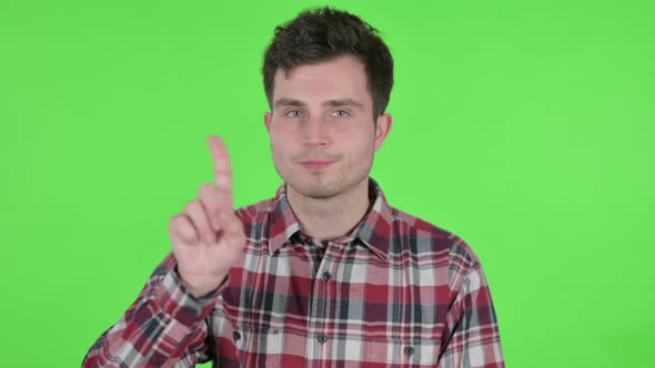 Portrait of Young Man Showing No Sign By Finger Green Chroma Screen ...