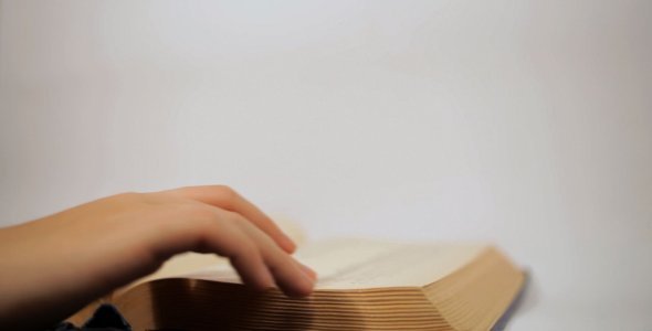 Looking up in the Dictionary (female), Stock Footage | VideoHive