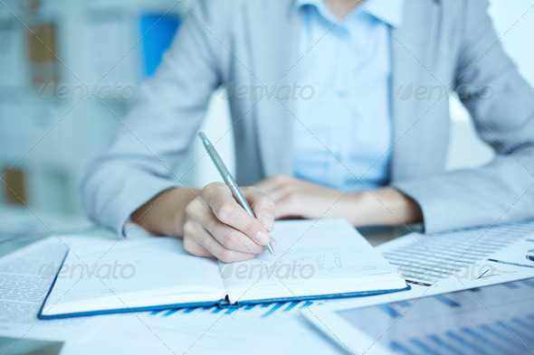 Writing business plan Stock Photo by Pressmaster | PhotoDune