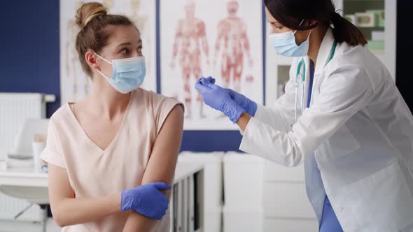 Video of female doctor giving shot to patient. Shot with RED helium ...