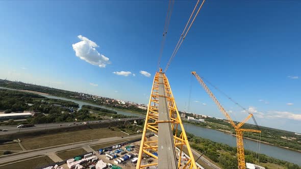 Powerful Tower Cranes Jibs Near Future Stadium Building, Stock Footage