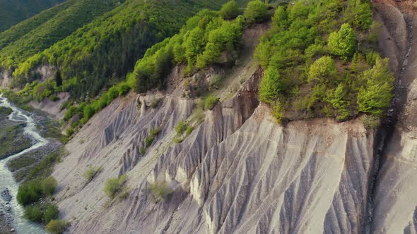 Topdown View of a Steep Cliff Covered with Green Vegetation, Stock Footage