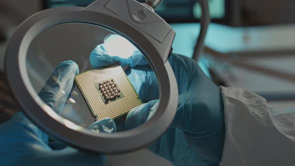 Hands of Technician Holding Computer Chip under Magnifying Glass, Stock ...