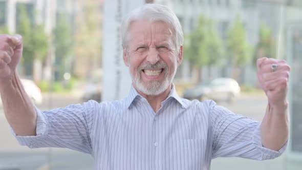 Portrait of Excited Old Man Celebrating Success Outdoor, Stock Footage