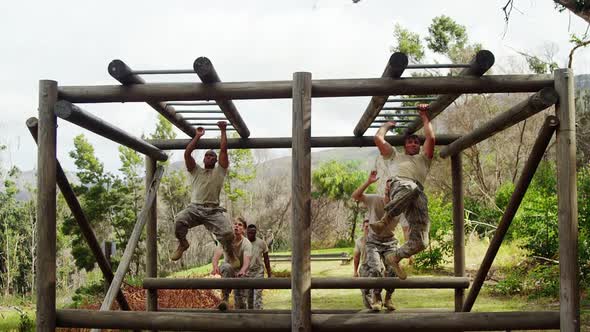 Military soldiers climbing monkey bars 4k, Stock Footage | VideoHive