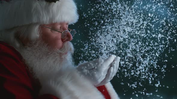 Santa Claus blowing snow from hands in slow motion, Phantom Flex 4K ...