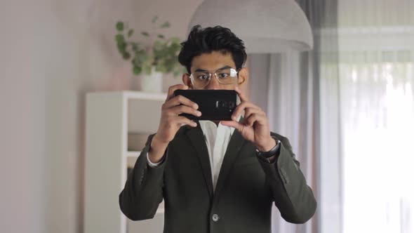 Real estate agent taking pictures of house apartment, static medium ...