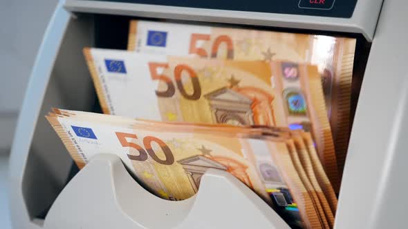 Orange Euro Banknotes Counted in a Machine., Stock Footage | VideoHive