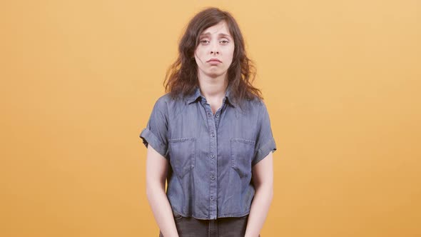 Portrait of a Sad Young Woman Looking Guilty, Stock Footage | VideoHive