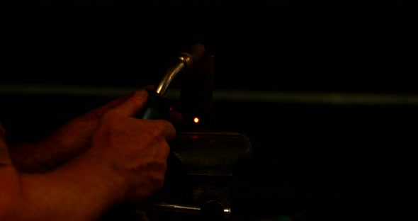 Blacksmith using a welding torch, Stock Footage | VideoHive