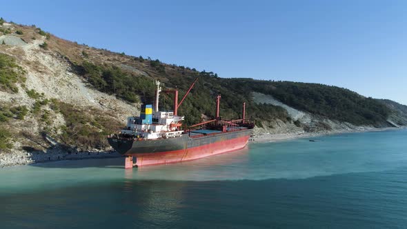 Sunny Landscape With Moored Tanker Vessel Ship Near The Slope Covered ...