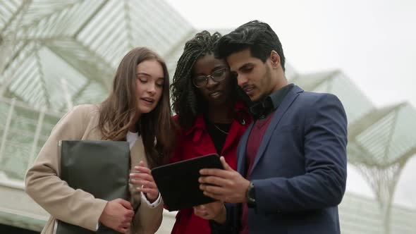 Three Young People Outside Googling on Tablet Place To Go, Stock Footage