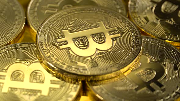 Physical Gold Bitcoin Coin Slowly Rotates. Macro Shot, Stock Footage
