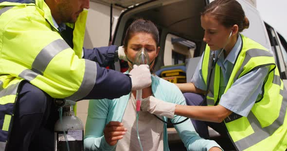 Patient receiving oxygen mask from ambulance team, Stock Footage ...