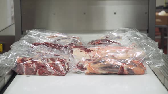 Meat Production the Process of Packaging Beef Meat Products in Plastic ...