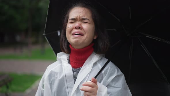 Devastated Little Woman Crying Out Loud Standing in City Park with ...