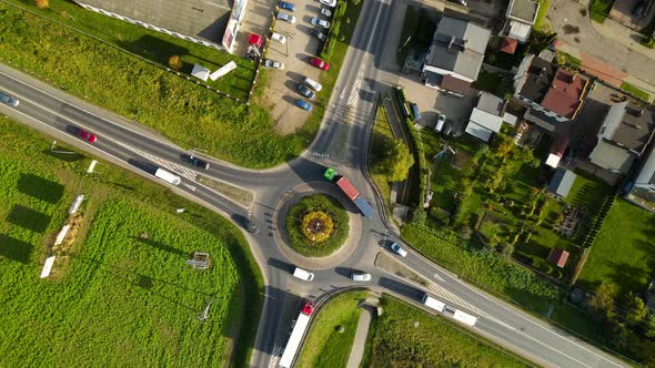 Vehicles Driving At Roundabout On A Sunny Day In Lubawa, Poland ...