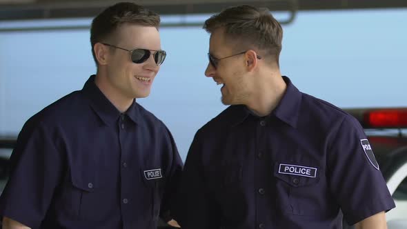 Friendly Police Buddies Smiling and Posing to Camera on Cop Station ...