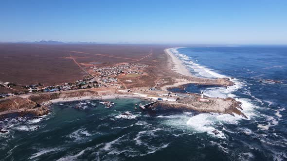High aerial pan shows quaint Doringbaai on South African west coast ...