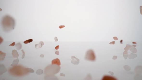 Camera follows colored salts falling on surface. Slow Motion., Stock ...