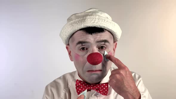 Emoji Clown - Crying Face. A sad mime clown with bigs tears running ...