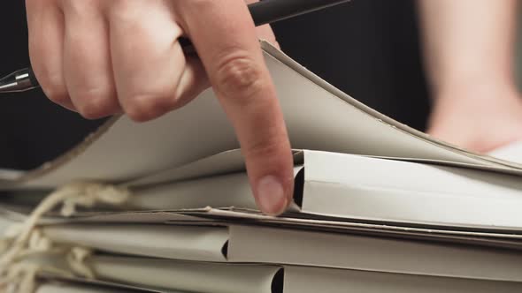 Raising and Sorting Through Folders with Hands Counting Files Searching ...