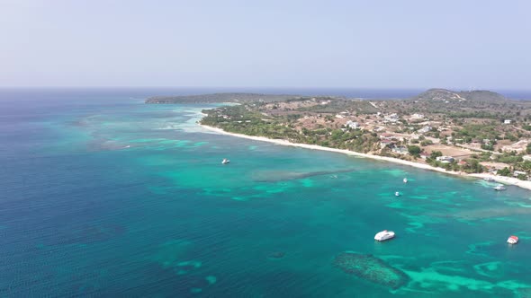 Drone flying over Caribbean waters of Playa Ensenada beach in Dominican ...