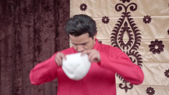 Muslim man adjusting cap, Stock Footage | VideoHive