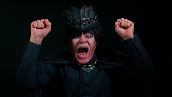 Sinister Old Man in Halloween Witcher Costume Screams From Stress ...