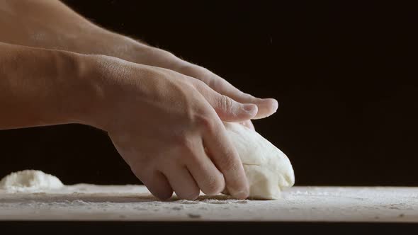 Male Hands Throw a Piece of Dough to a Wooden Table and Sprinkle It ...
