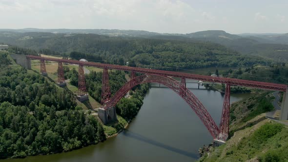 Aerial Panorama Shooting of the Beautiful Red Railway Bridge Over the ...
