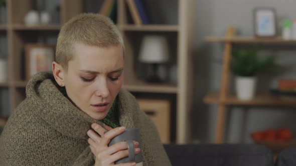 Sick Woman Warming with Hot Tea Because of High Temperature, Stock Footage