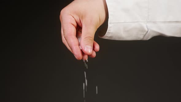 Professional Chef Adding Salt Closeup a Pinch of Seasoning, Stock Footage