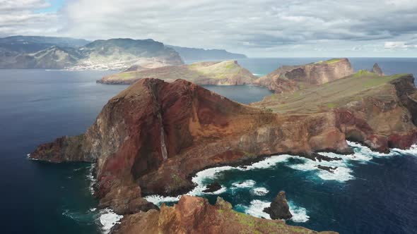 Breathtaking Views of Volcanic Islets with Charming Village Behind ...