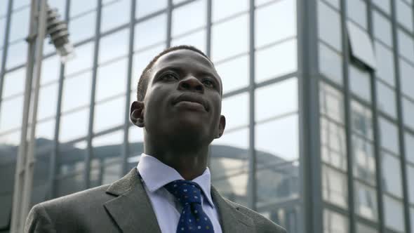 Challenge, Success. Young black african business man looking ahead ...