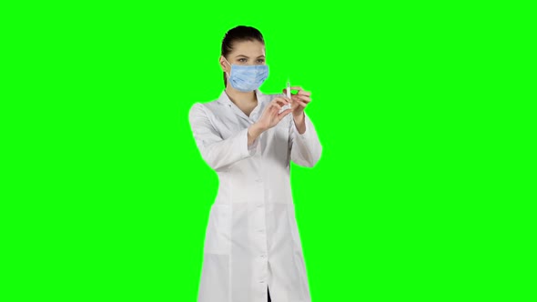 Syringe with a Medicine in a Hand. Green Screen, Stock Footage | VideoHive