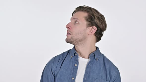 Scared Young Man Looking Around Worried on White Background, Stock Footage