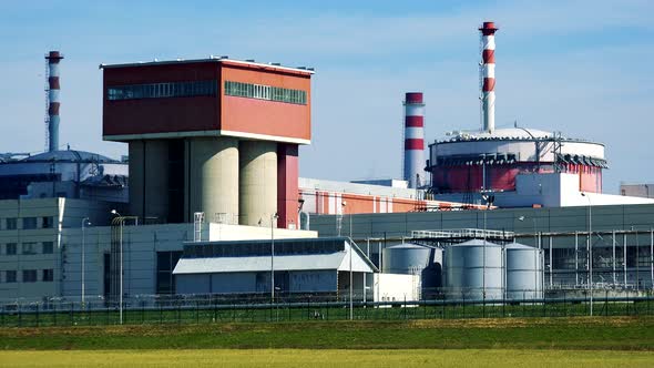 Factory (Nuclear Power Station) - Closeup of Buildings and Chimneys ...