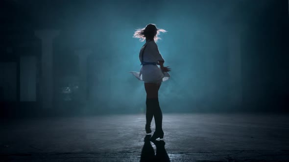 Woman dancing in the fog, Stock Footage | VideoHive
