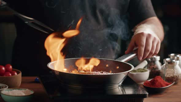 Chef Frying Ribs with Flambe Technique, Stock Footage | VideoHive