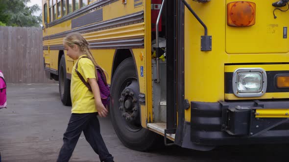 Students get off school bus, slow motion, Stock Footage | VideoHive