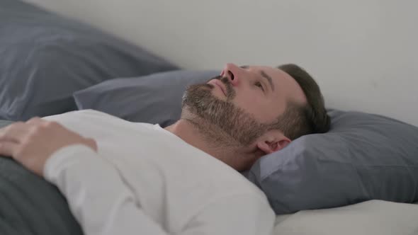 Man Awake in Bed Thinking, Stock Footage | VideoHive