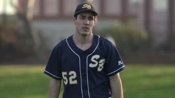 A young man playing catch with a baseball, Stock Footage | VideoHive