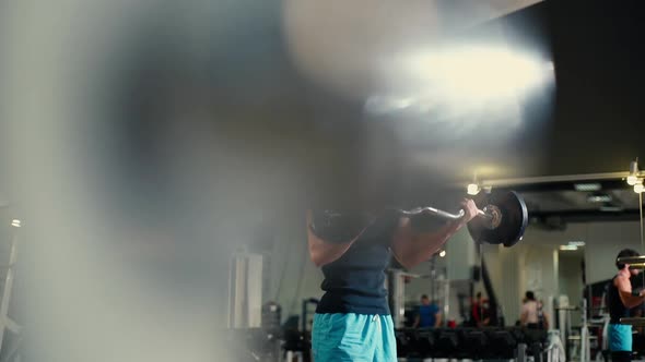 Sportive Bearded Young Man with Muscular Wiry Body Lifting Barbell ...