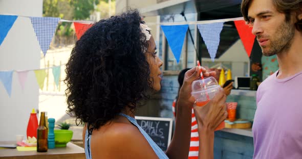 Romantic couple sharing juice, Stock Footage | VideoHive