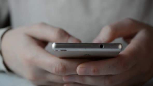 Fingers of a Young Man Texting on a Smartphone, Stock Footage | VideoHive
