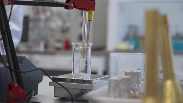 Tubes in laboratory. Boiling liquid in tube. Biologists laboratory ...