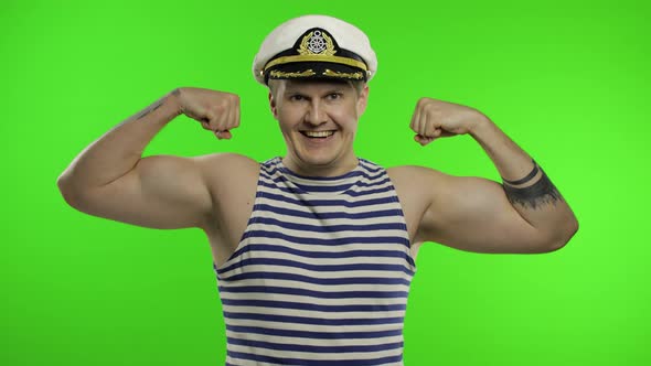 Young Sailor Man Shows Muscles, Looking at Camera. Seaman Guy in Sailor ...
