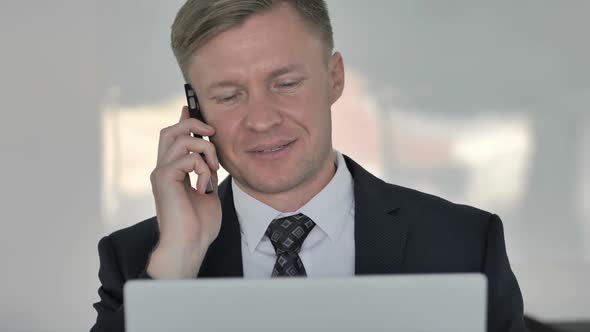 Close Up of Happy Businessman Talking on Phone Negotiating with ...